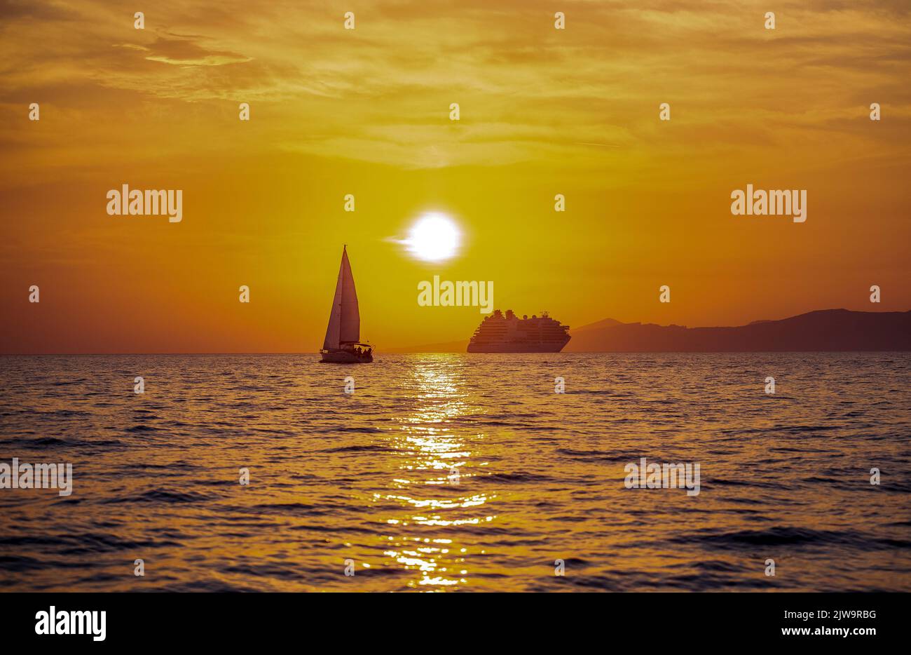 Sailing toward the sun Stock Photo - Alamy