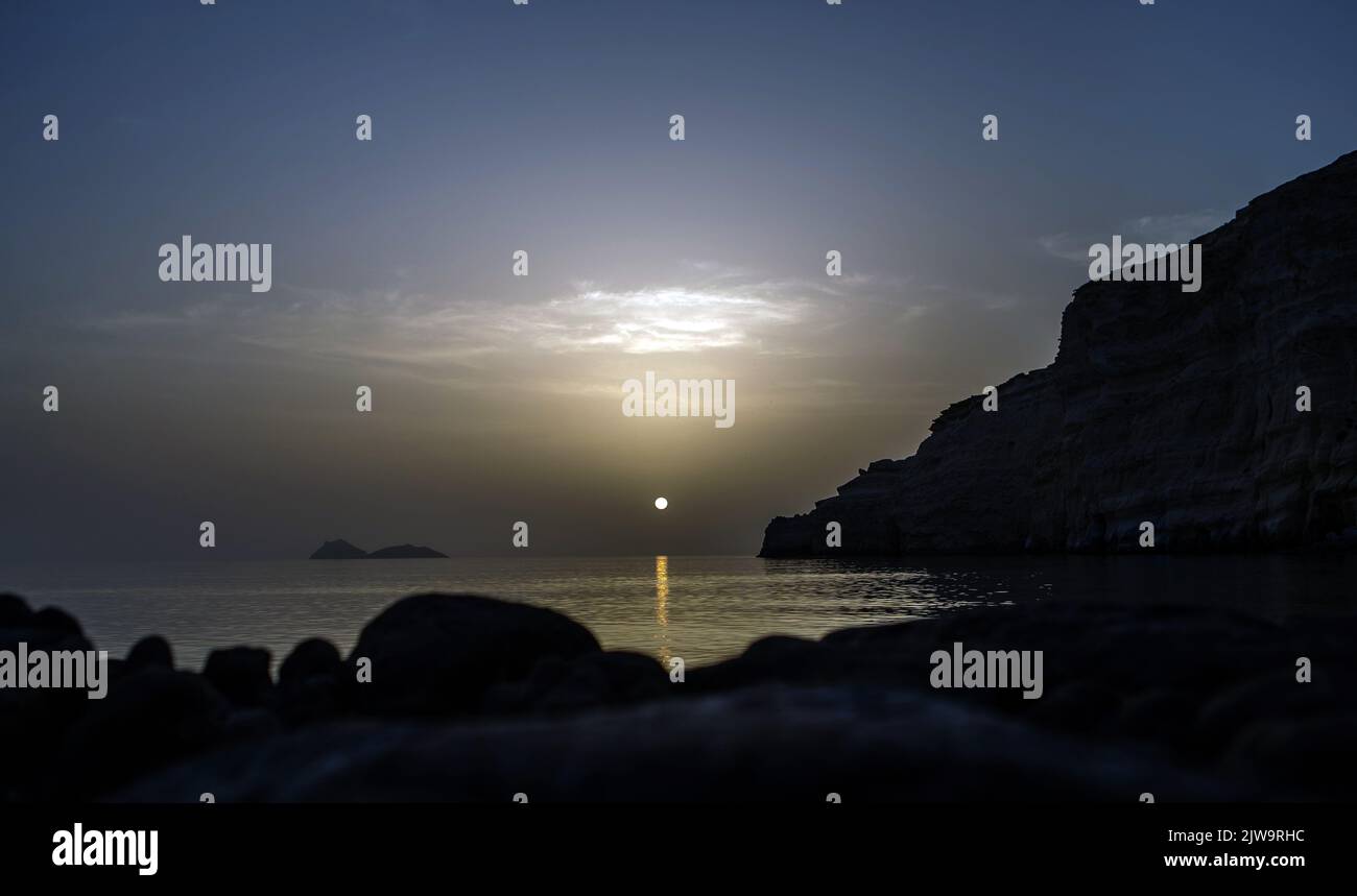 Sailing toward the sun Stock Photo - Alamy