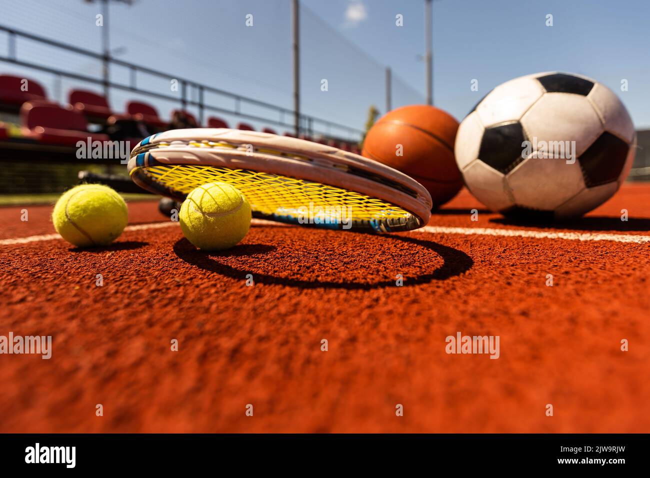 Set of sport equipment, rackets and tennis balls soccer and basketball ...
