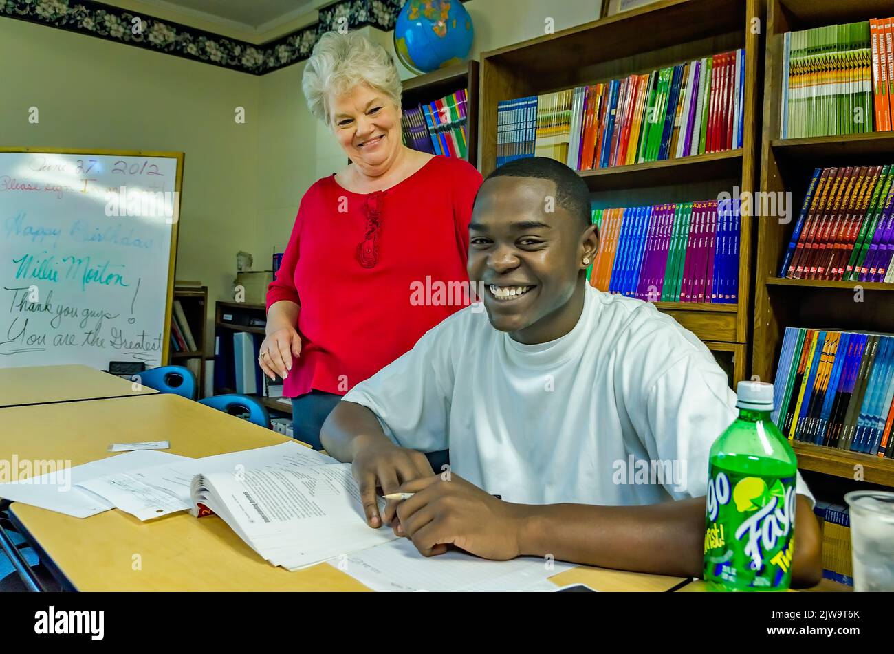 A GED Instructor Linda Malbrough smiles as she poses for a picture with ...