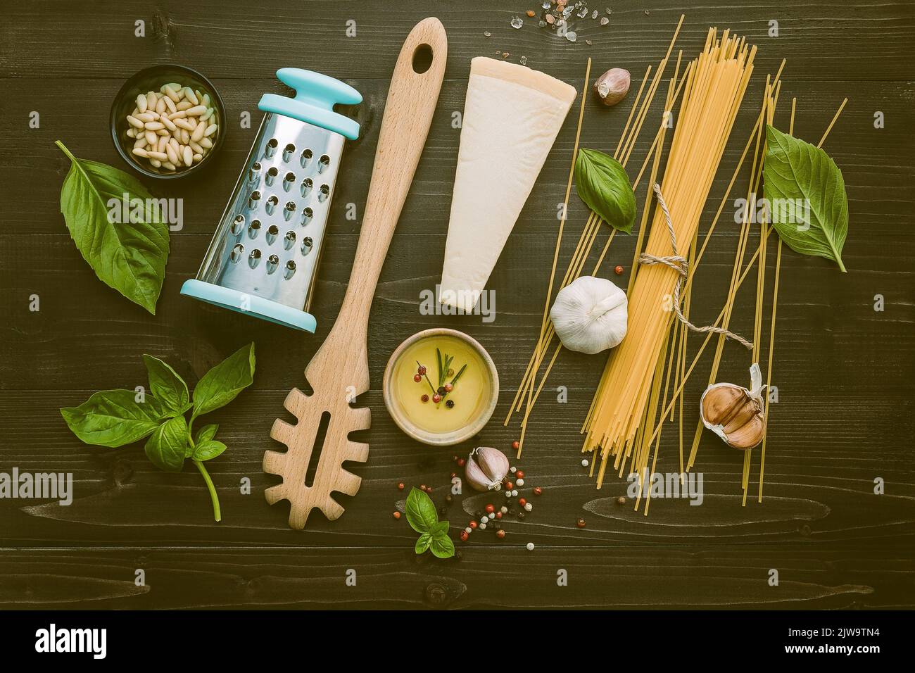 A top view of spaghetti and different food cooking equipment and ...