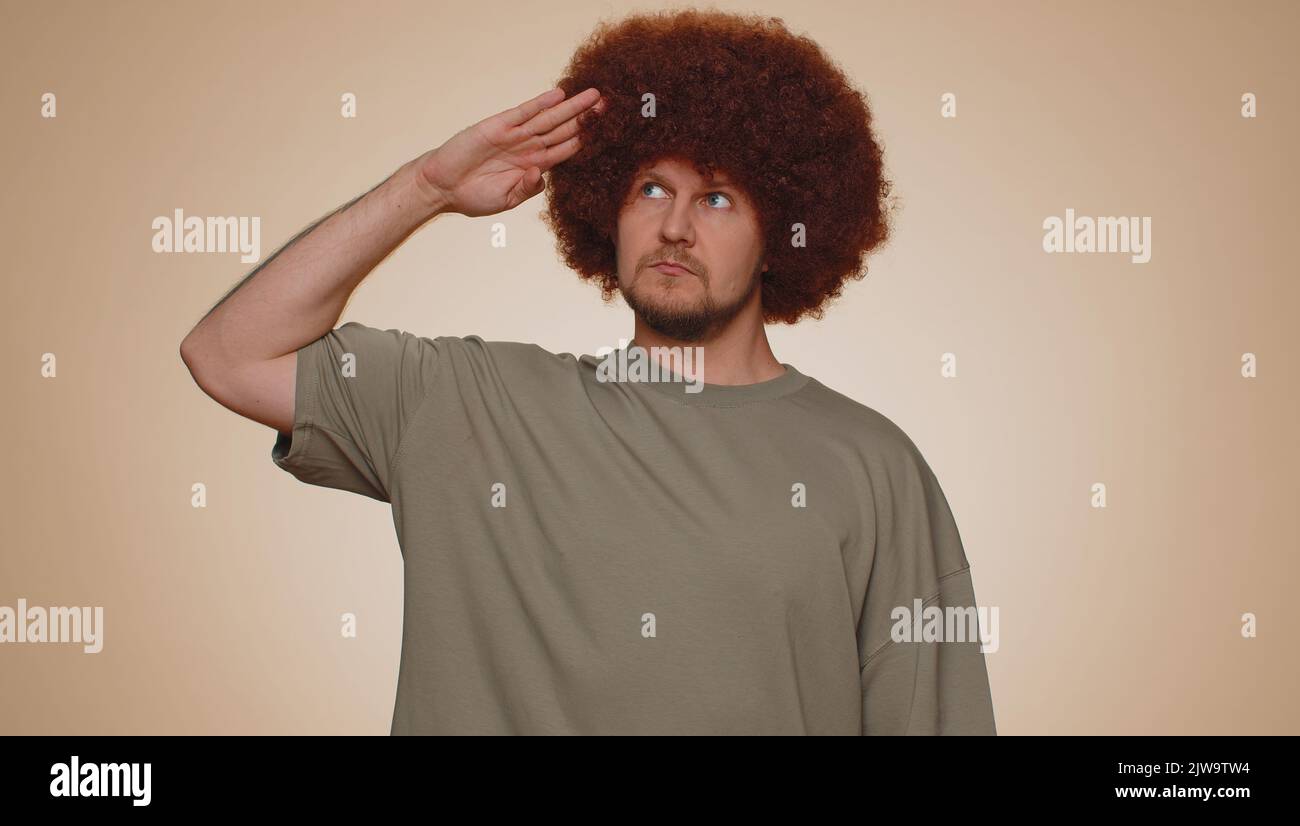 Yes sir. Subordinate, responsible, serious bearded man giving salute ...