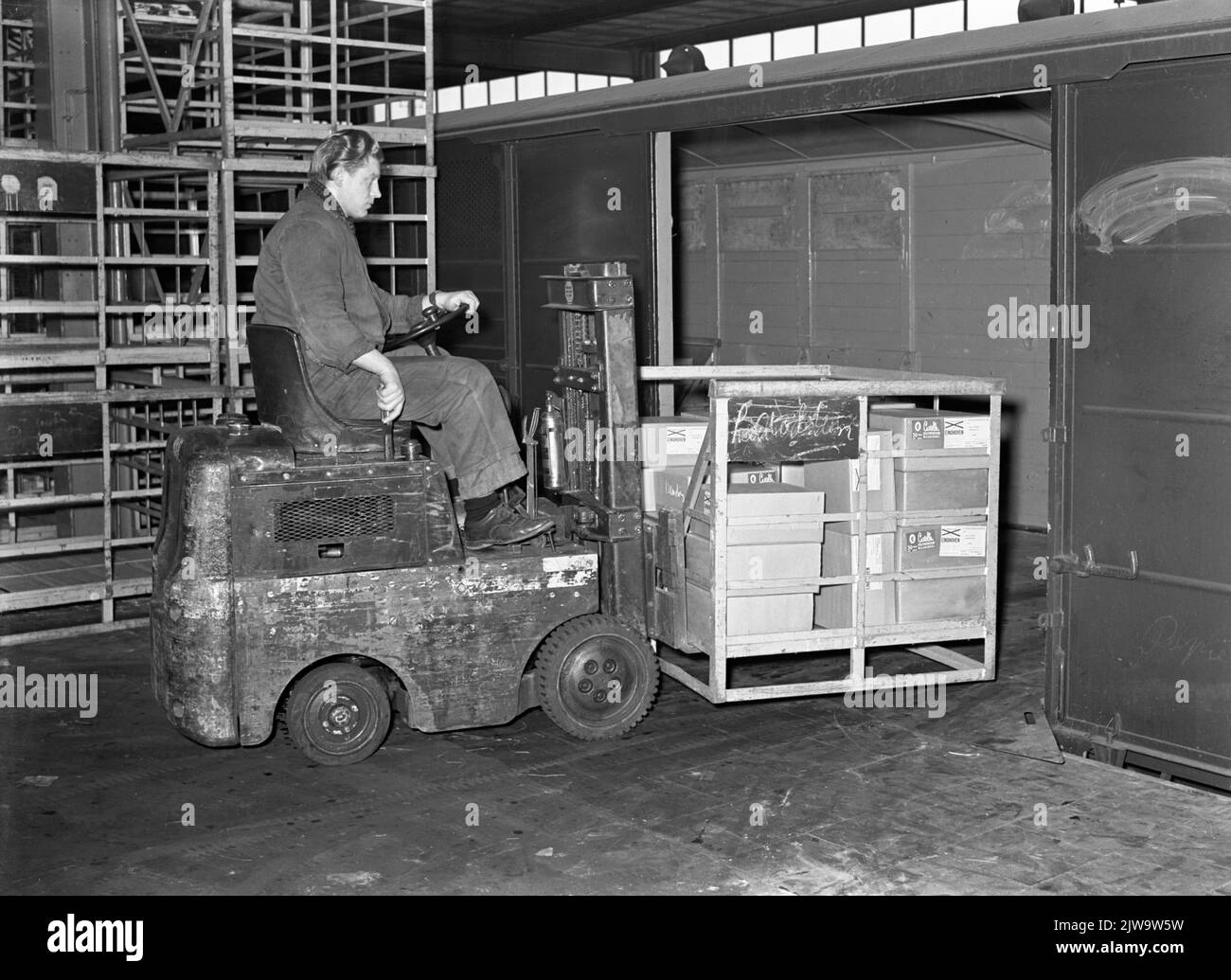 Image of the loading of a freight wagon by Van Gend & Loos using a ...