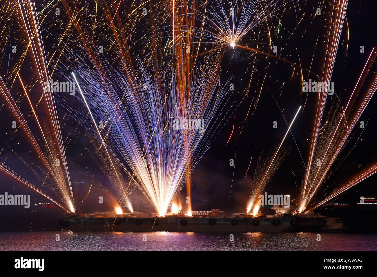 Gorgeous multi-colored fireworks display on dark blue night sky Stock ...
