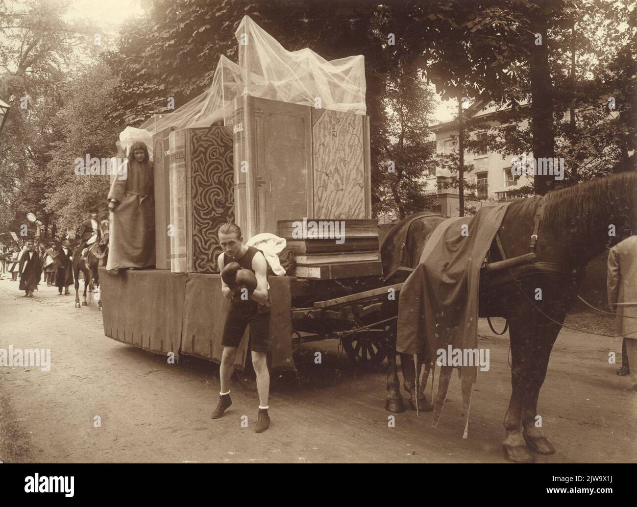 Image of a group in the costumed parade "The Wisdom and the Five ...