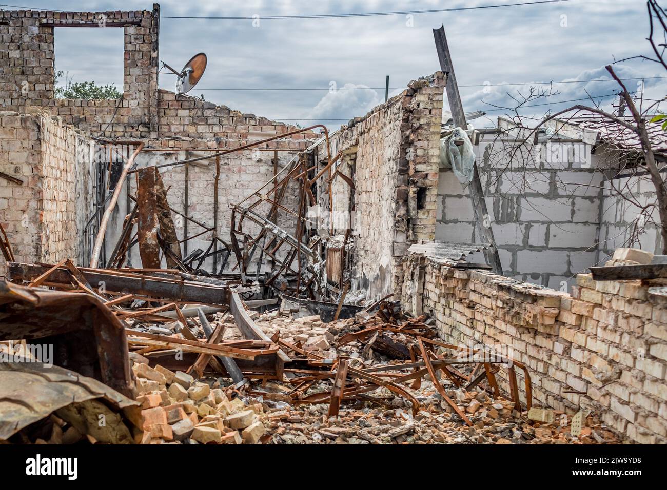 Ruined house. Ruins of a residential building. Brick walls. War in ...