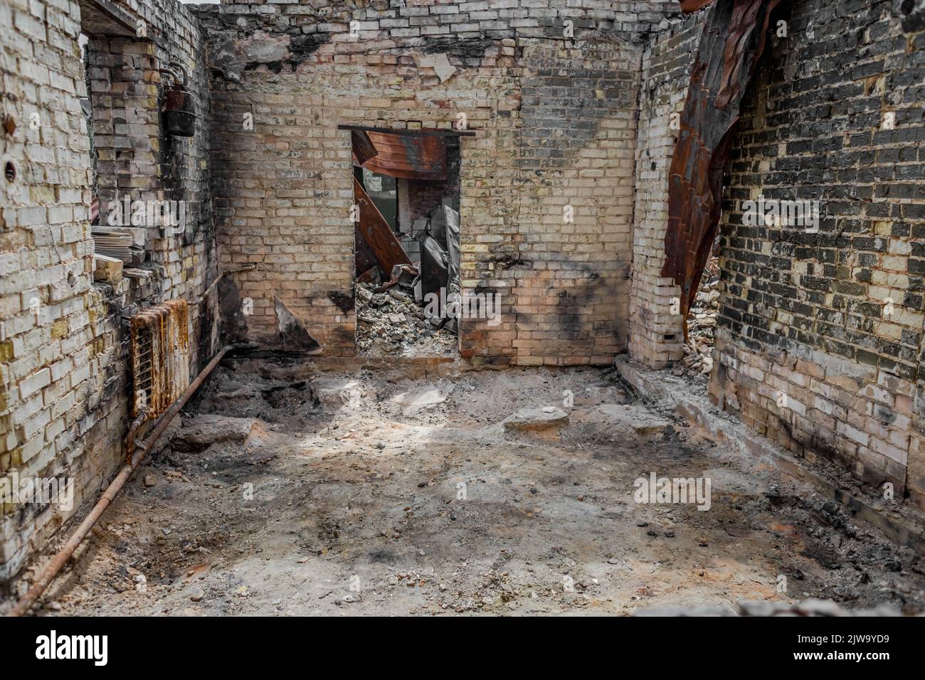 Ruined house. Ruins of a residential building. Brick walls. War in ...