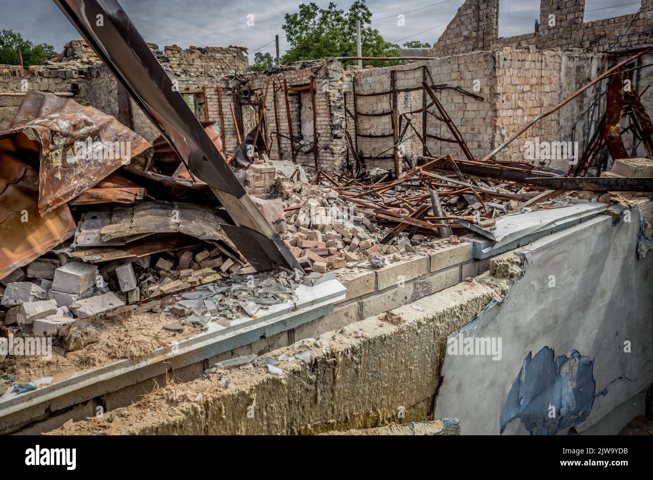 Ruined house. Ruins of a residential building. Brick walls. War in ...
