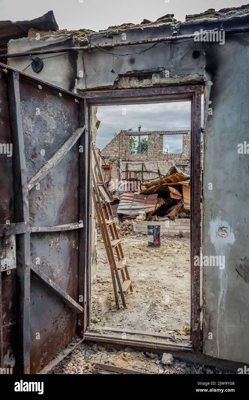 Ruined house. Ruins of a residential building. Brick walls. War in ...
