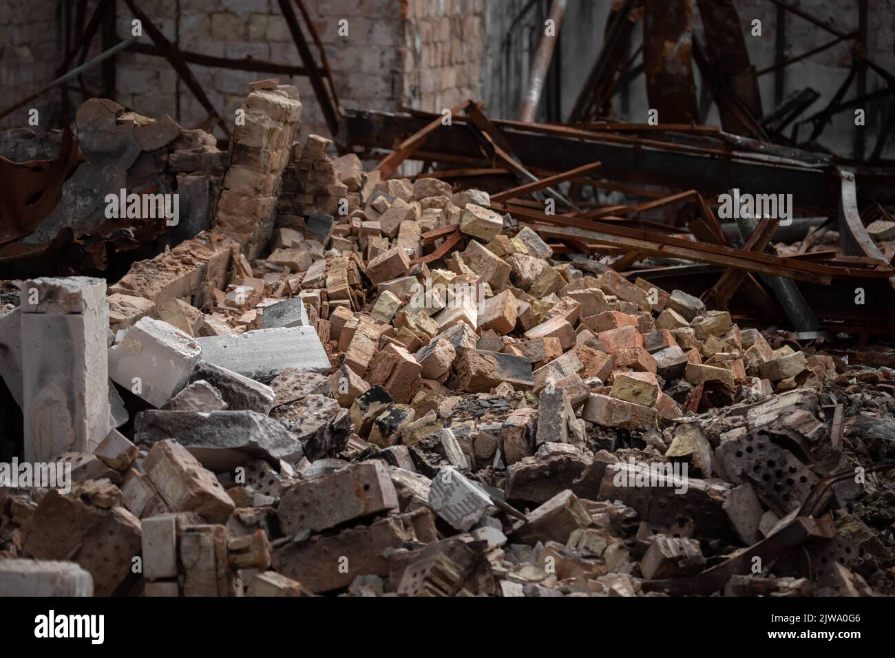 Stone dump on the ruins of a private house. A pile of construction ...