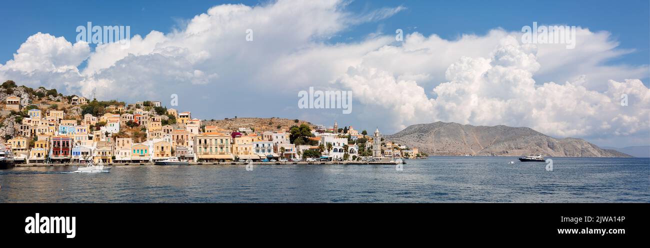 Panoramic view, aerial skyline of small haven of Symi island. Village ...