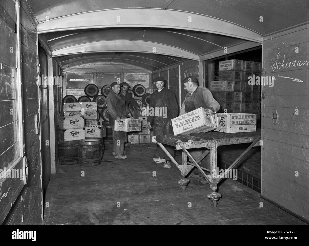Image of the loading of a freight wagon with crates and cask beer Stock ...
