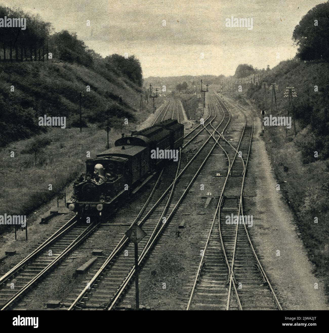 Image of a local train with a steam locomotive from the 7000 series of ...