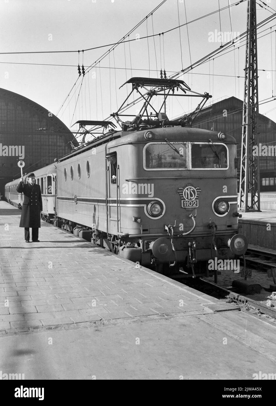 Image of the electric locomotive No. 1102 (series 1100) with carriages ...