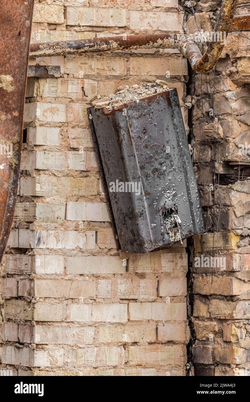 Fire location. Fallen house. Burnt gas column. Consequences of Russian ...