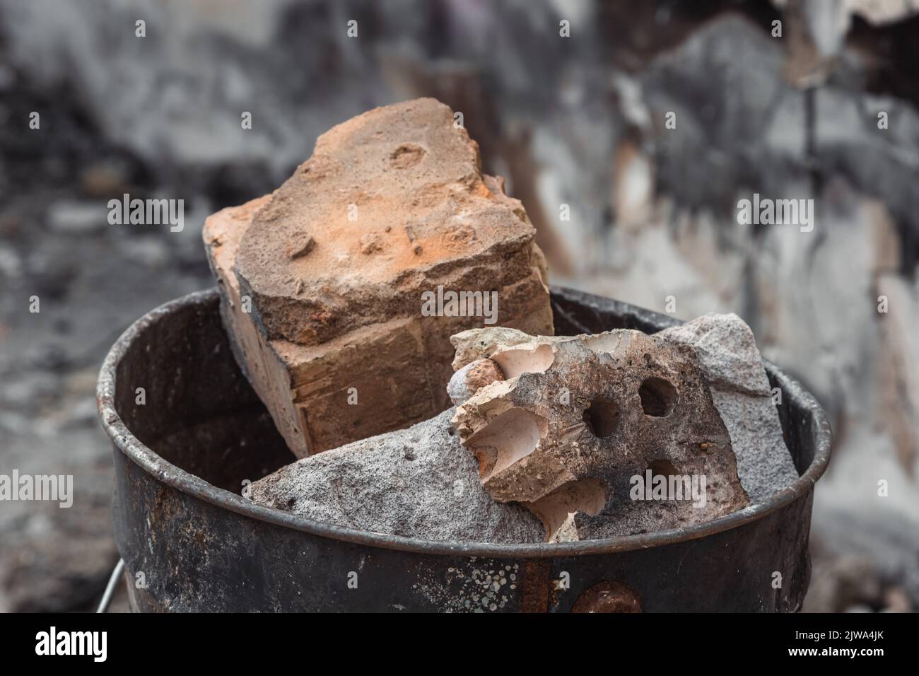 Stone dump on the ruins of a private house. A pile of construction ...