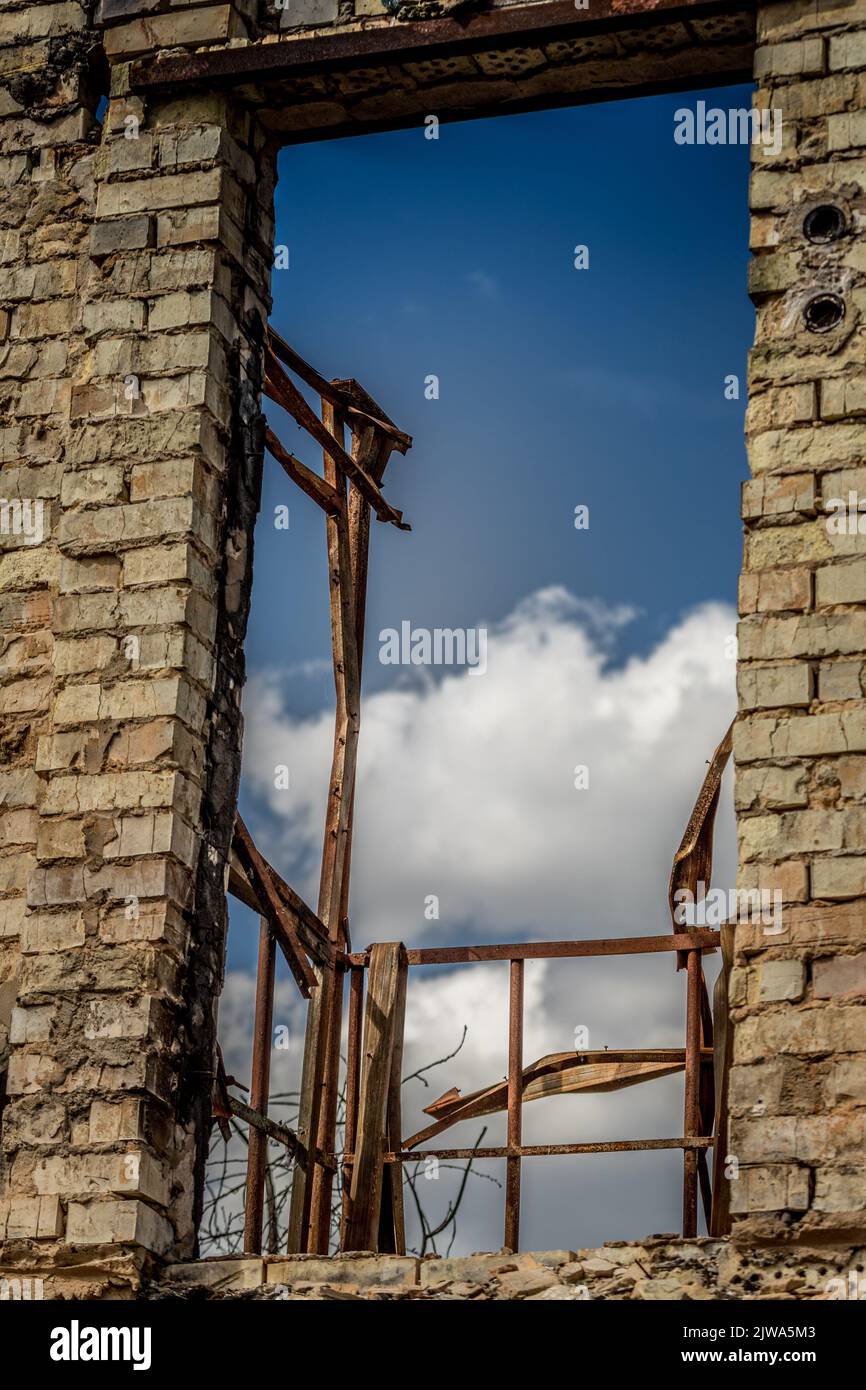 Ruined house. Ruins of a residential building. Brick walls. War in ...
