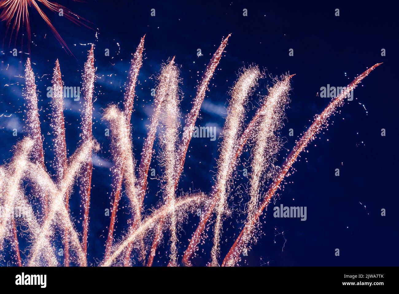 Bright light flash of fireworks, against the background of the night ...