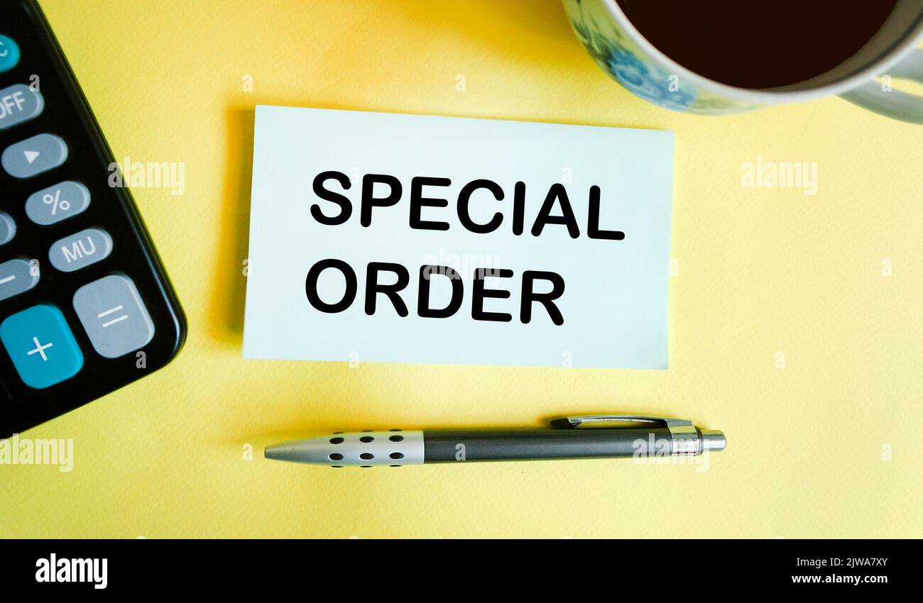 Special order text on a sticker on a yellow paper background, next to ...
