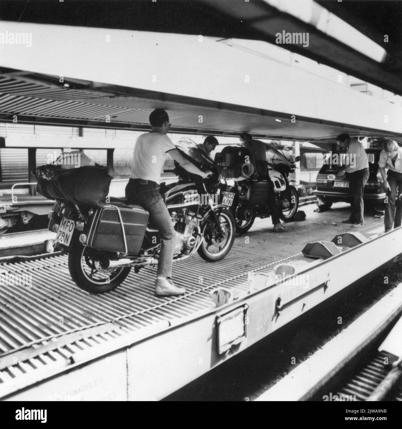 Image of placing a few motorcycles on a car sleeping train Stock Photo ...