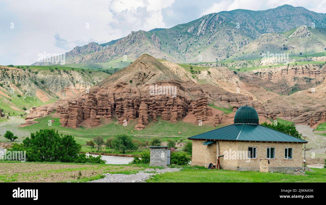 Landscape in Kyrgyzstan with a local mosque. Kyrgyzstan is rich in ...