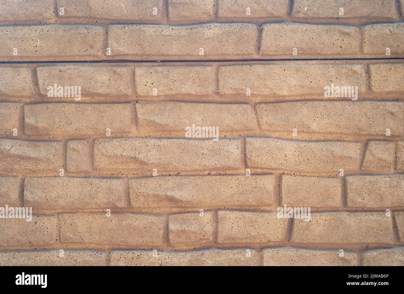 Background texture of stone - brick decoration of the facade of the ...