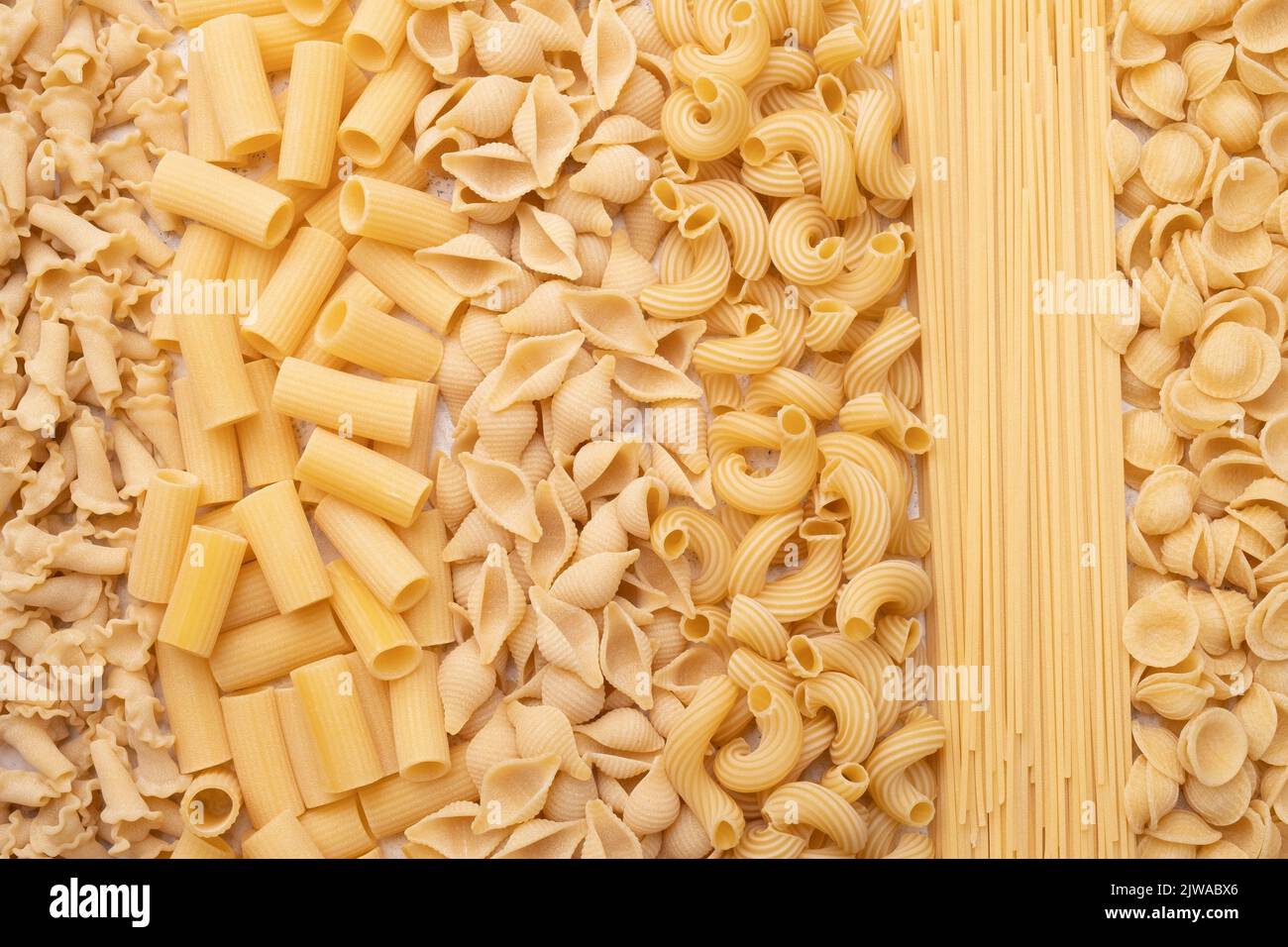 Different types italian uncooked pasta hi-res stock photography and ...