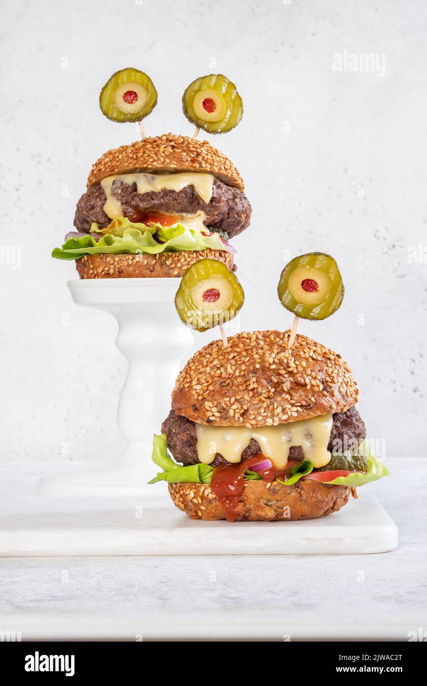 Halloween burger in shape of scary monster Stock Photo - Alamy