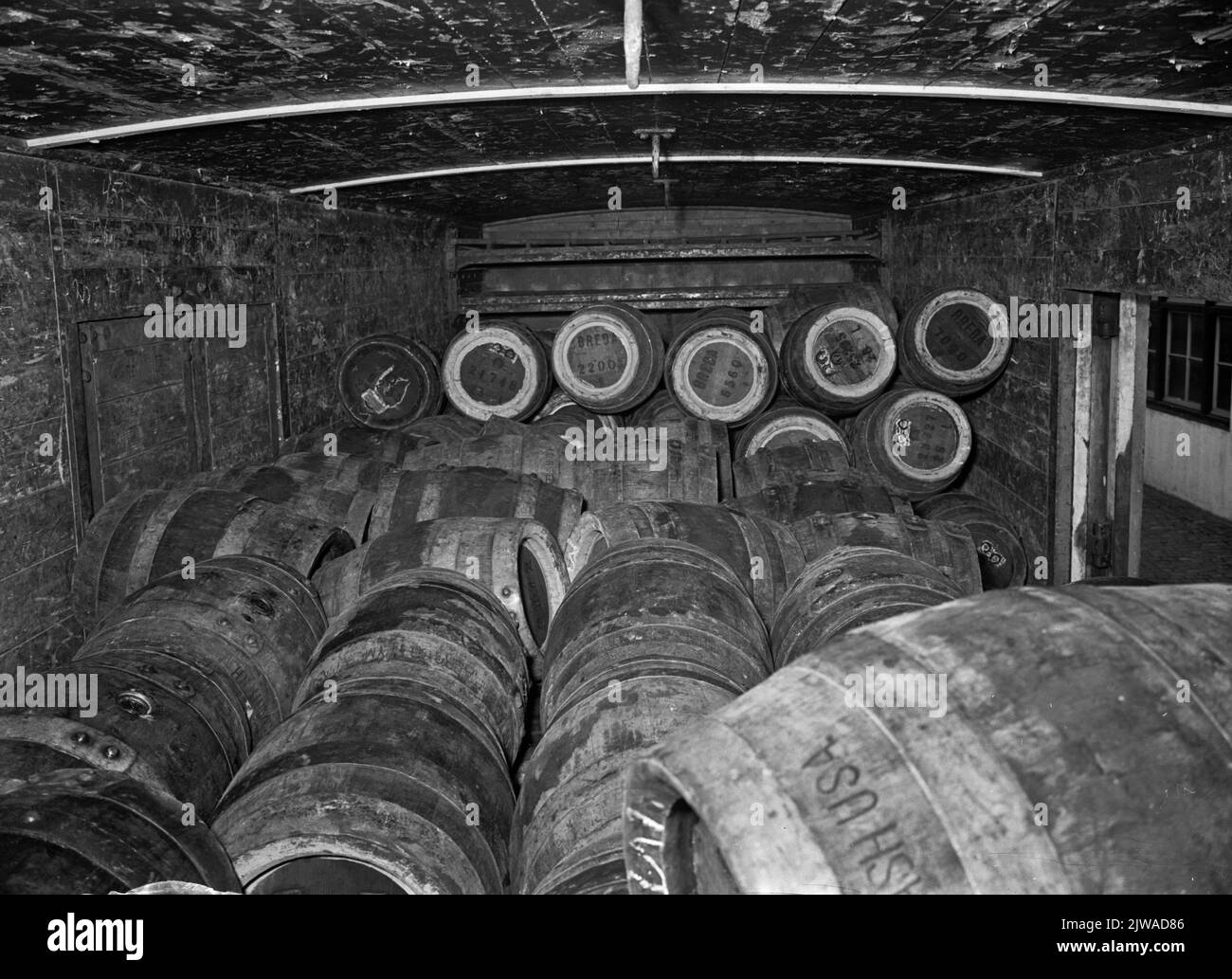 Image of the loading of a goods wagon with a cask beer Stock Photo - Alamy