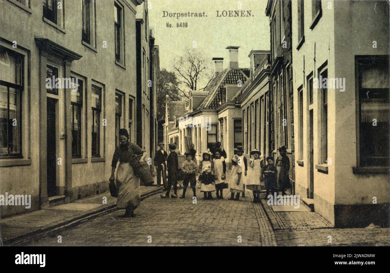 Face in the Dorpsstraat with buildings in the snow in Loenen from the ...