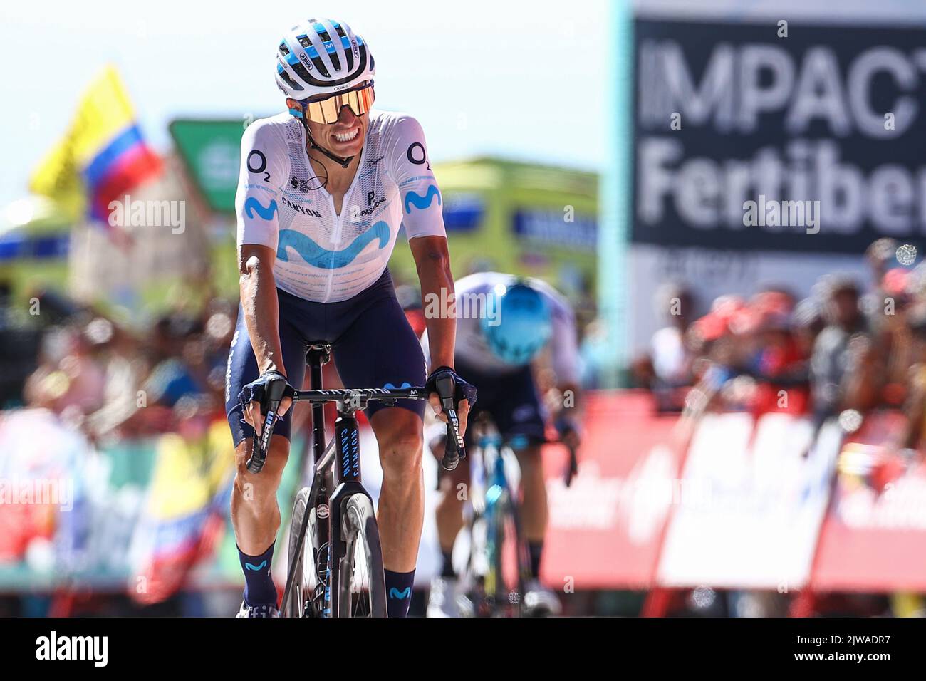 Spanish Enric Mas of Movistar Team crosses the finish line of stage 15 ...