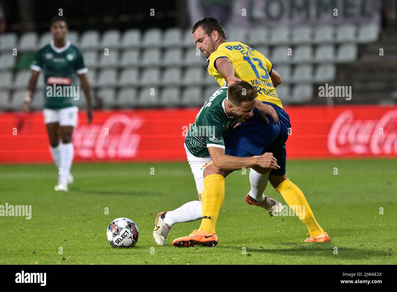 Lommel's Robin Henkens and Beveren's Joachim Van Damme fight for the ...