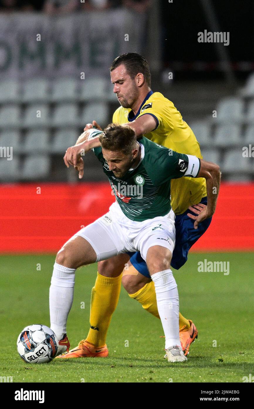 Lommel's Robin Henkens and Beveren's Joachim Van Damme fight for the ...