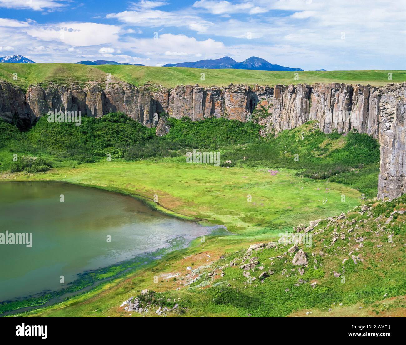 lost lake surrounded by cliffs in the shonkin sag glacial outflow ...