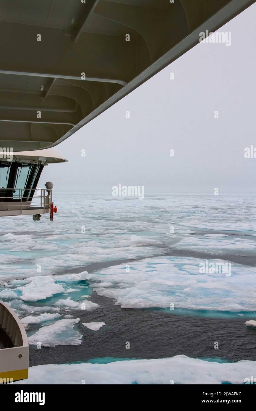 Bridge of cruise ship navigating ice field in Canadian high arctic ...