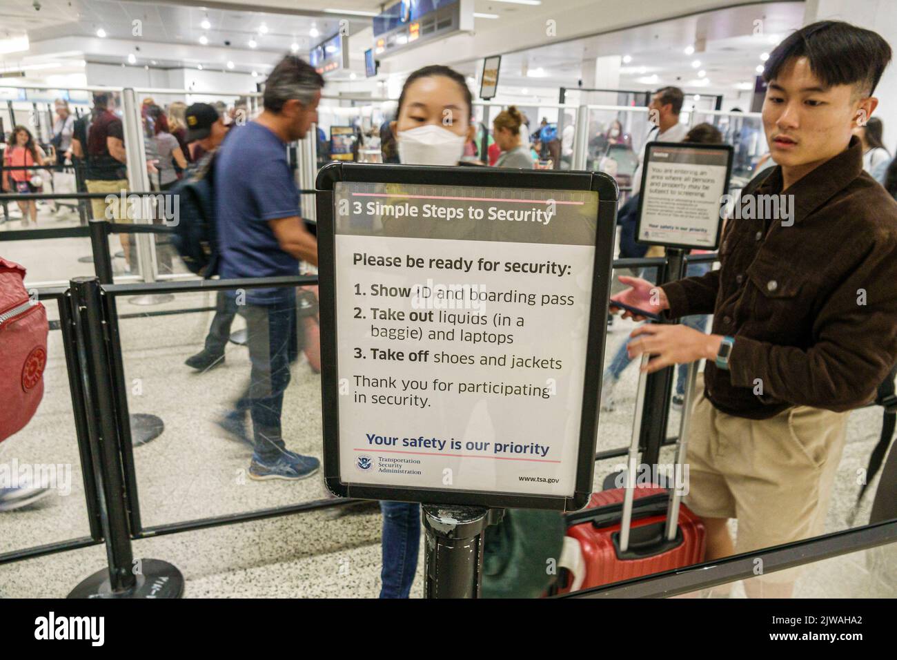 Us airport security check on passenger hi-res stock photography and ...