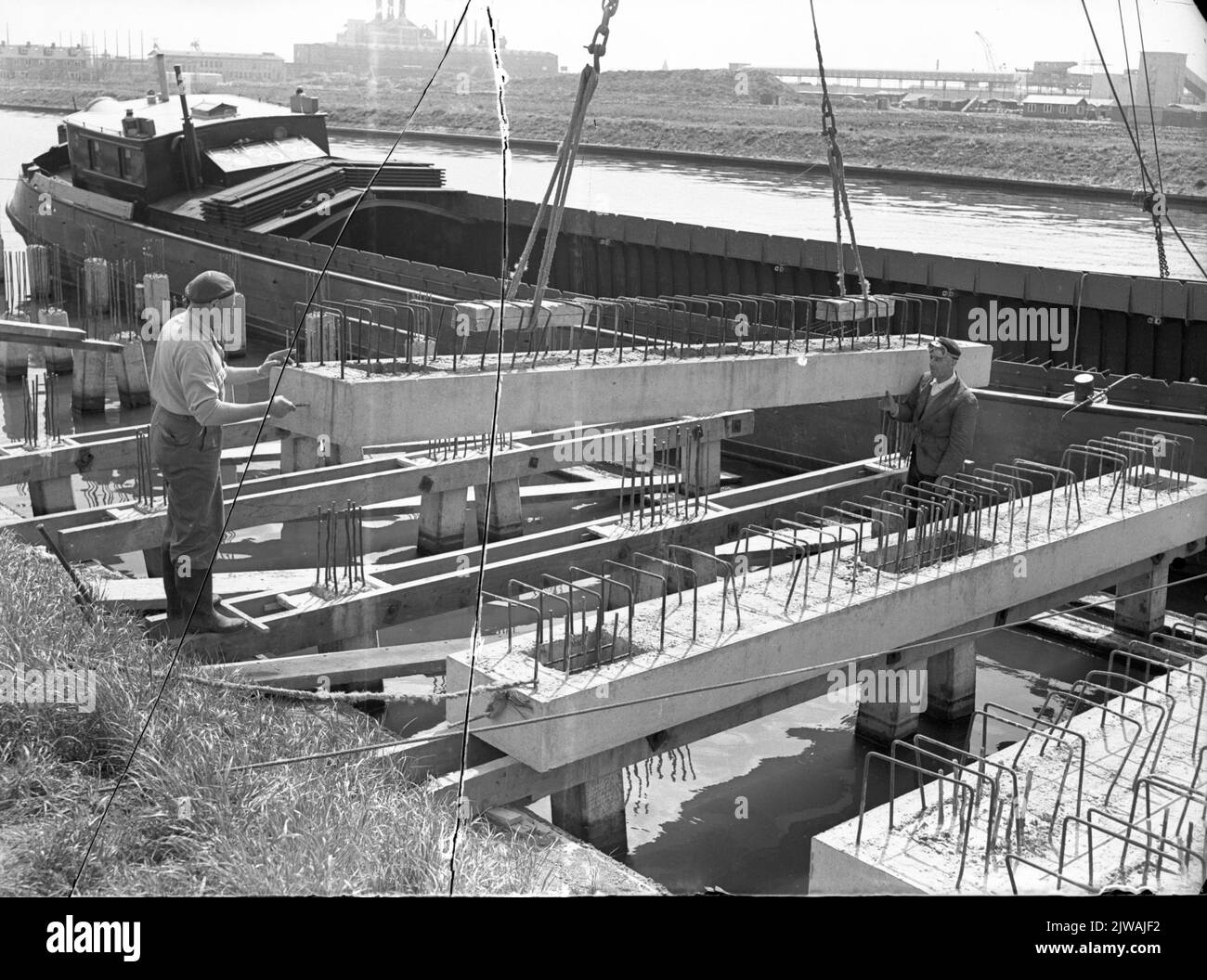 Image of setting concrete pins on the sets for the construction of the ...