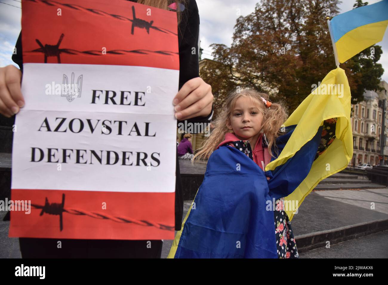 Lviv, Ukraine. 04th Sep, 2022. A girl holds a Ukrainian flag during the ...