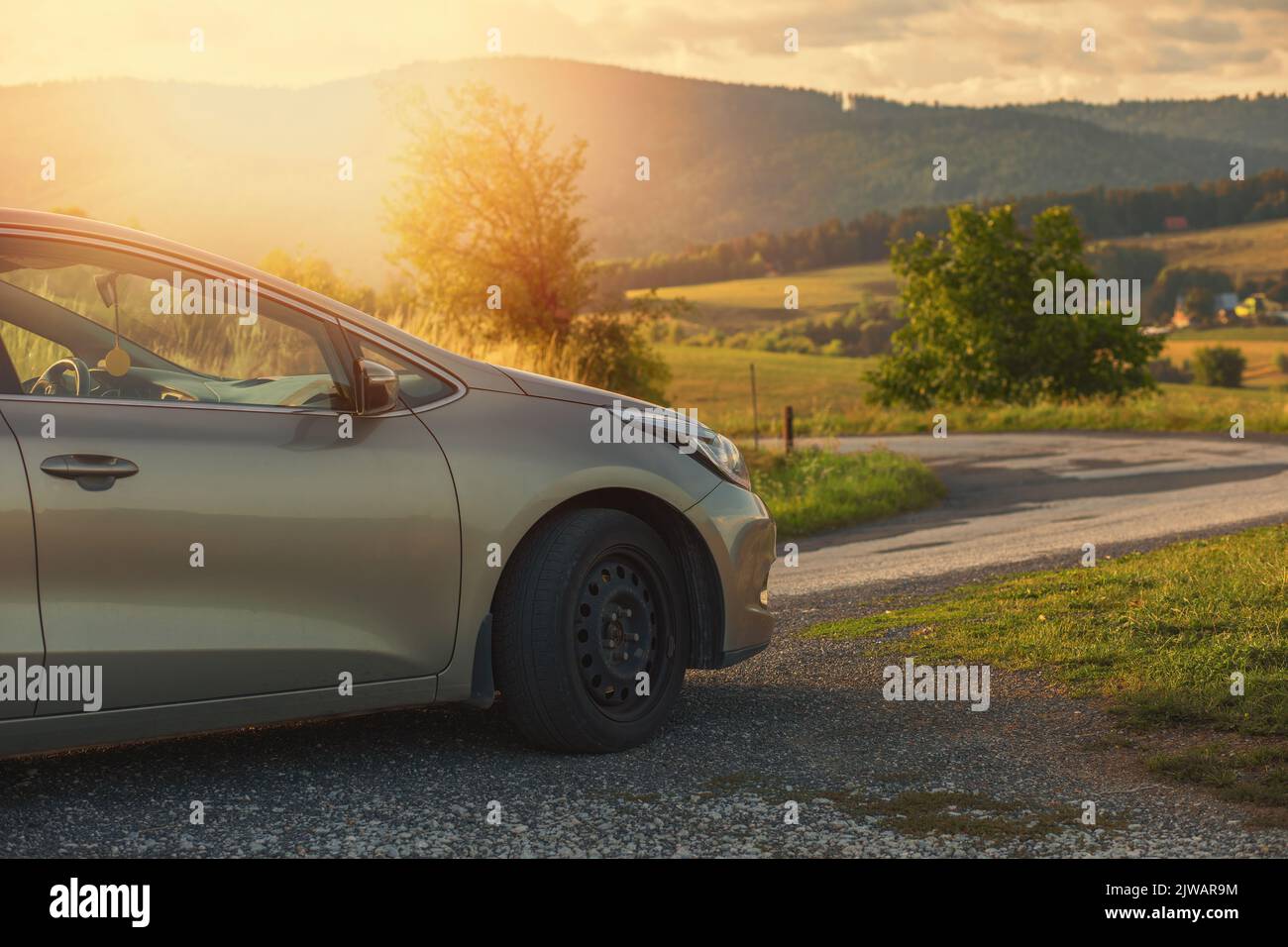 Car on country road by the green field.High quality photo. High quality ...