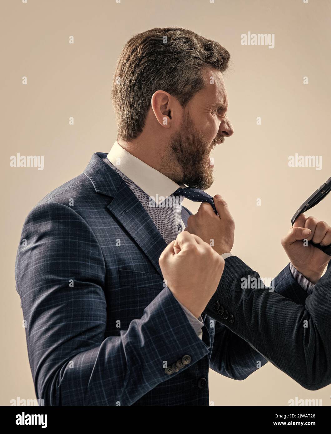 Aggressive man in suit scream fist fighting with colleague grey ...