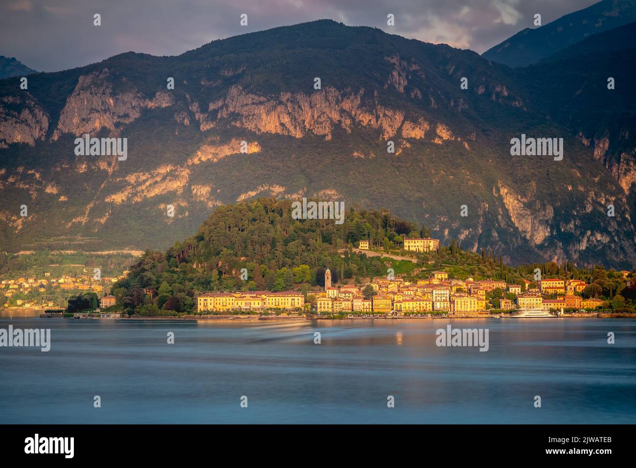Mountains and Bellagio skyline, view from Lake Como at sunset, northern ...