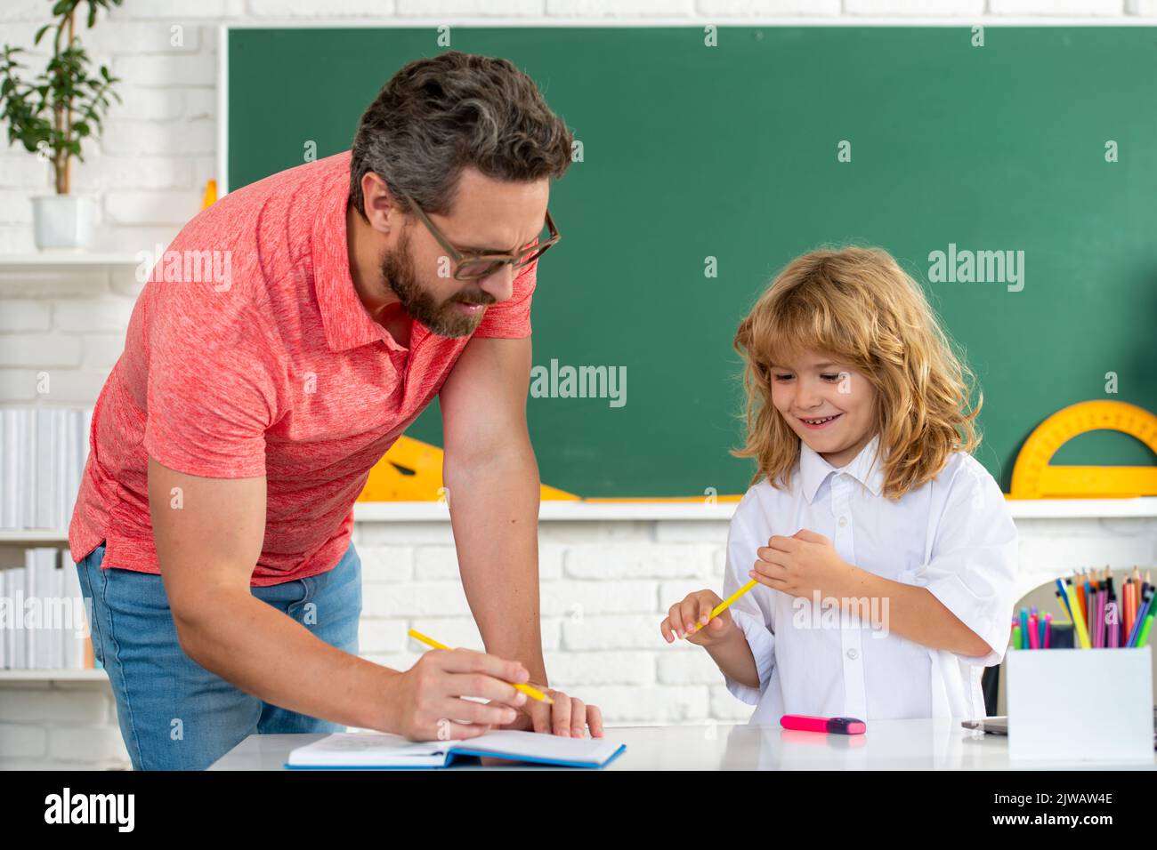 Happy family teacher schoolboy hi-res stock photography and images - Alamy