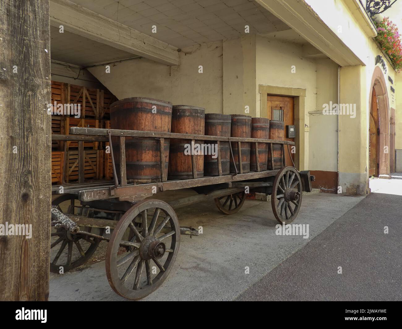 wooden cart with wooden containers used in the past for collecting ...