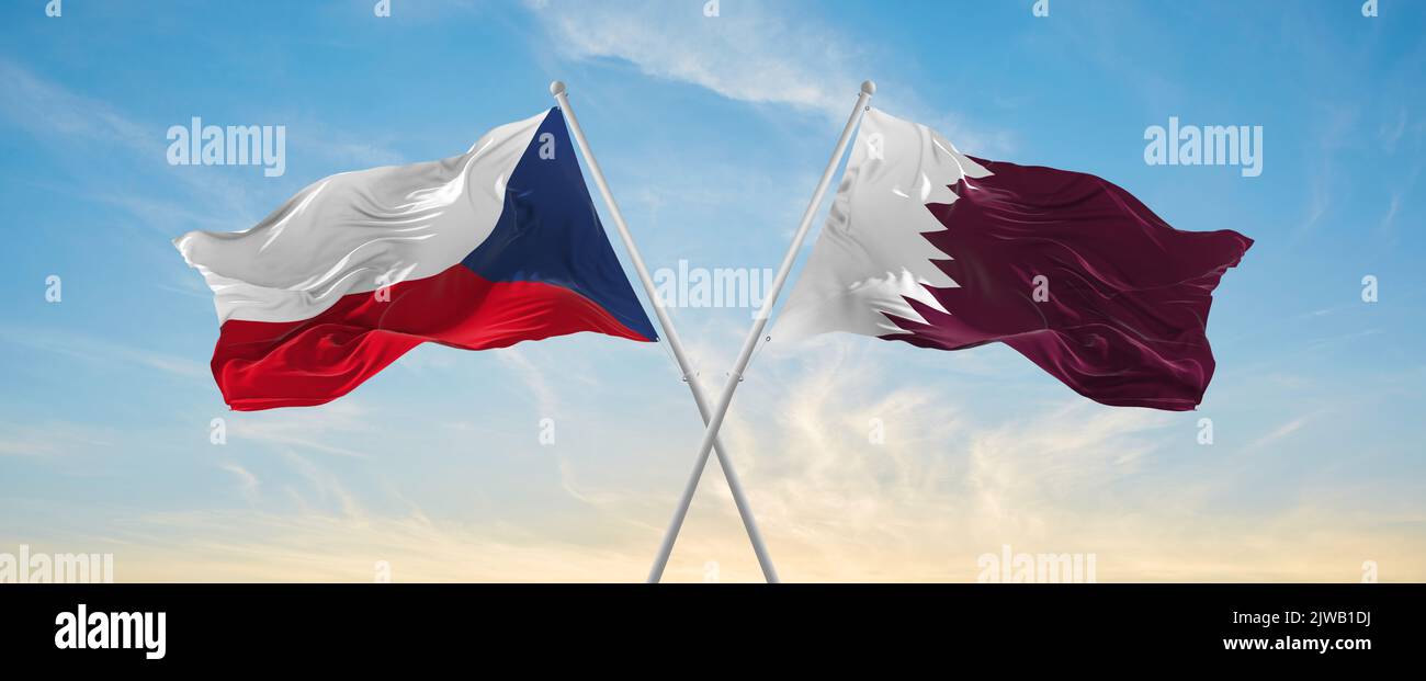 two crossed flags Qatar and Czech republic waving in wind at cloudy sky. Concept of relationship ...