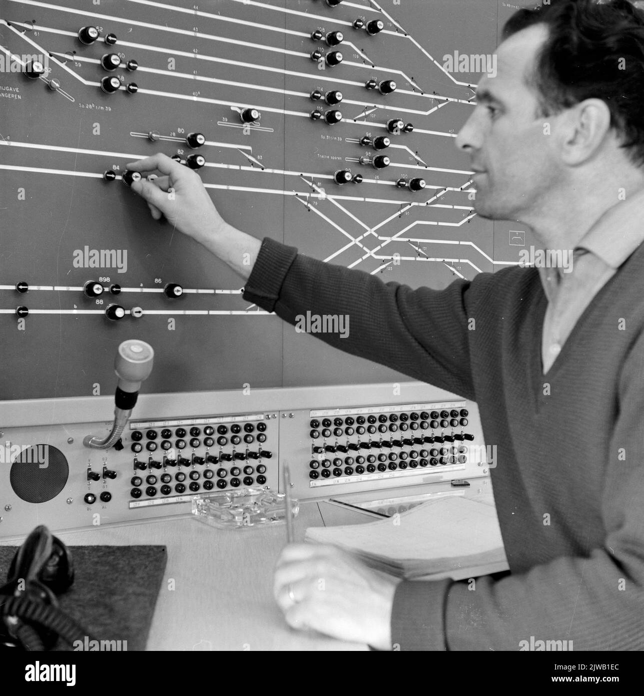 Image of a train service leader at the NX control tableau in the ...