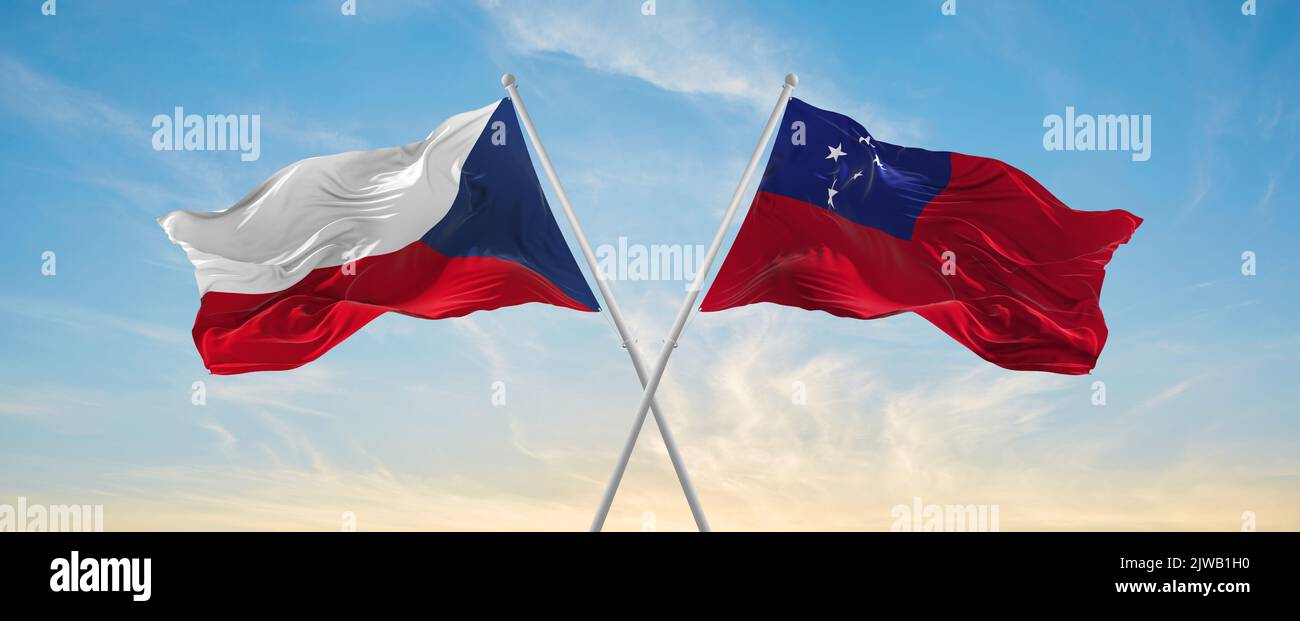 two crossed flags Samoa and Czech republic waving in wind at cloudy sky ...