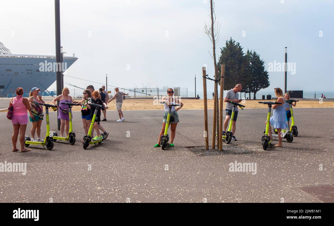 Tourists in Lisbon getting ready to drive electric scooters Stock Photo ...