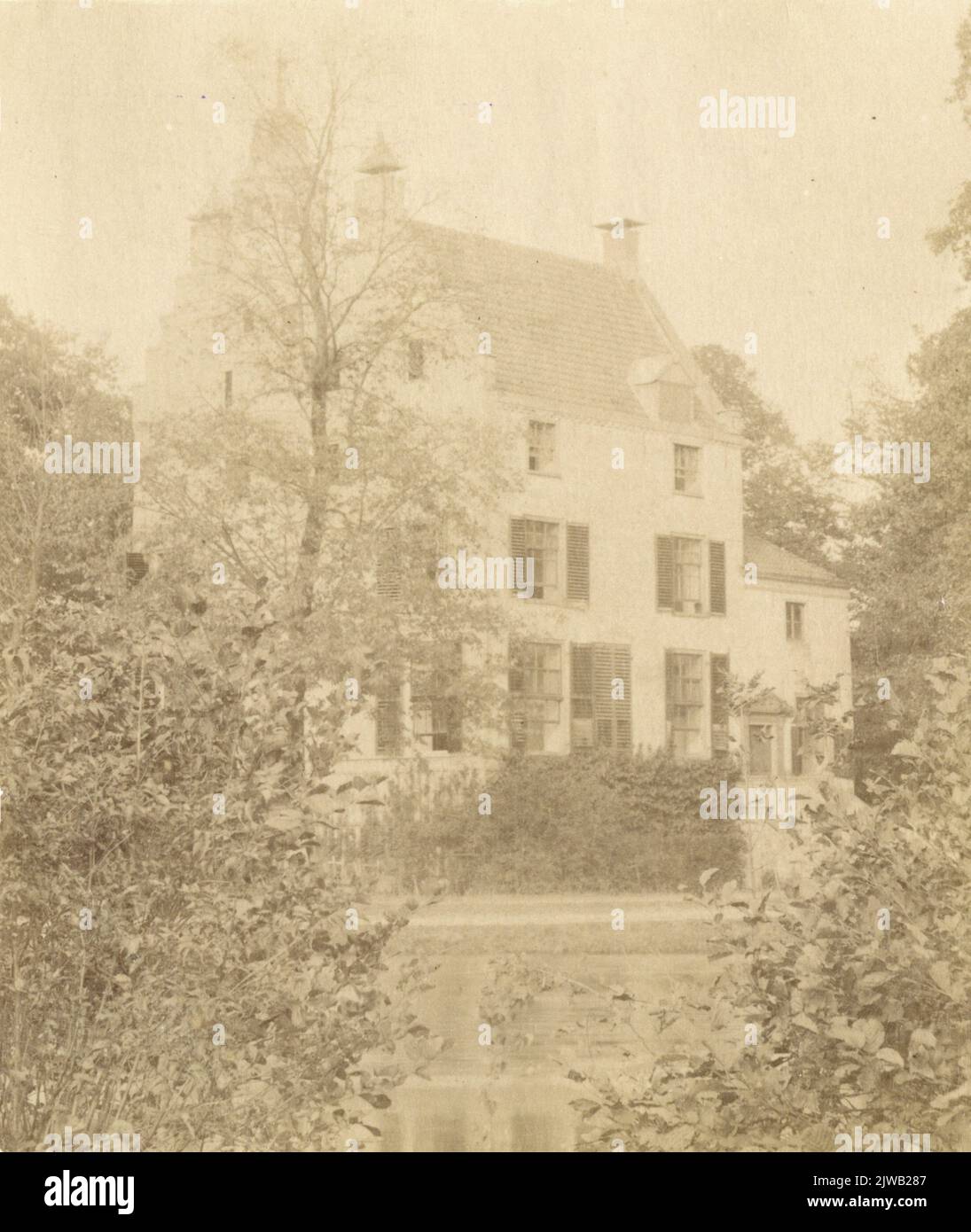 View of the left and facade of the Oudaen castle with surrounding park ...