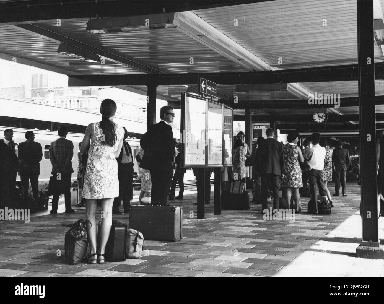 Image of waiting train travelers on the new, fourth platform of the N.S ...
