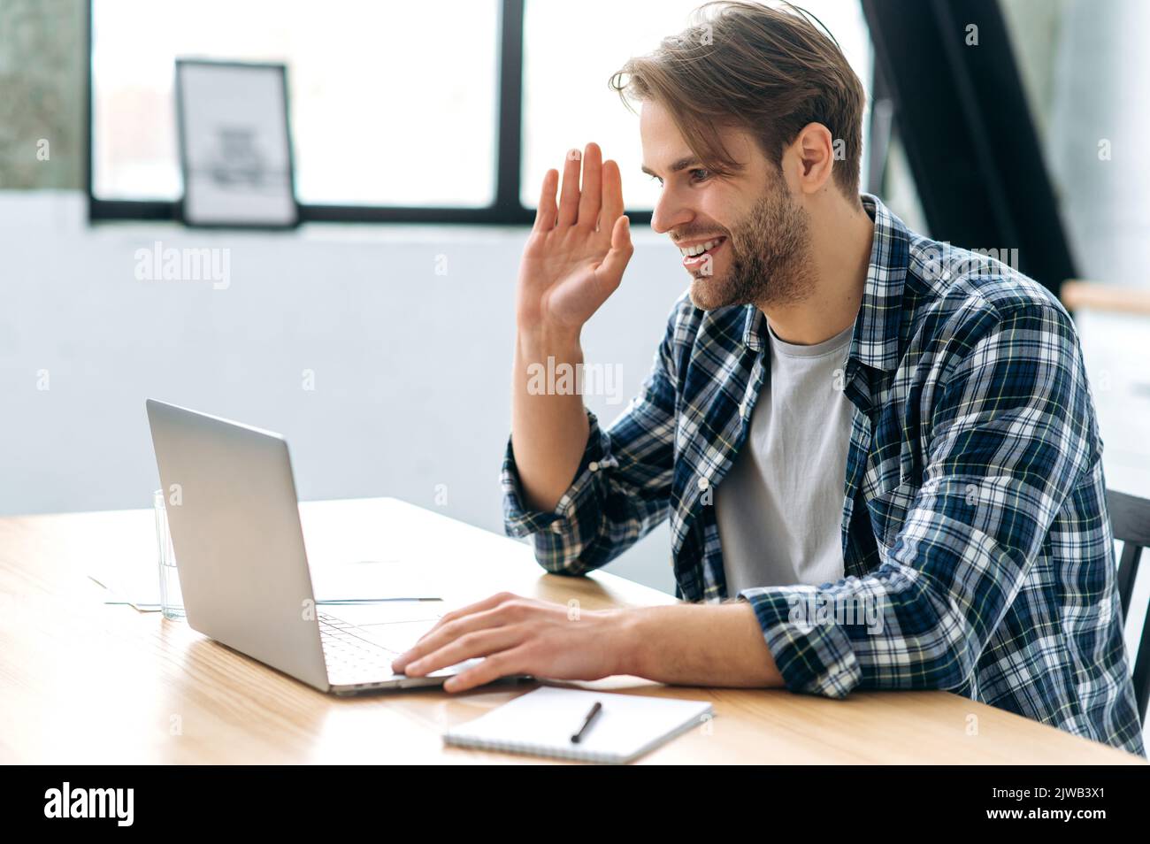 Friendly positive caucasian young man, student, freelancer, company ...